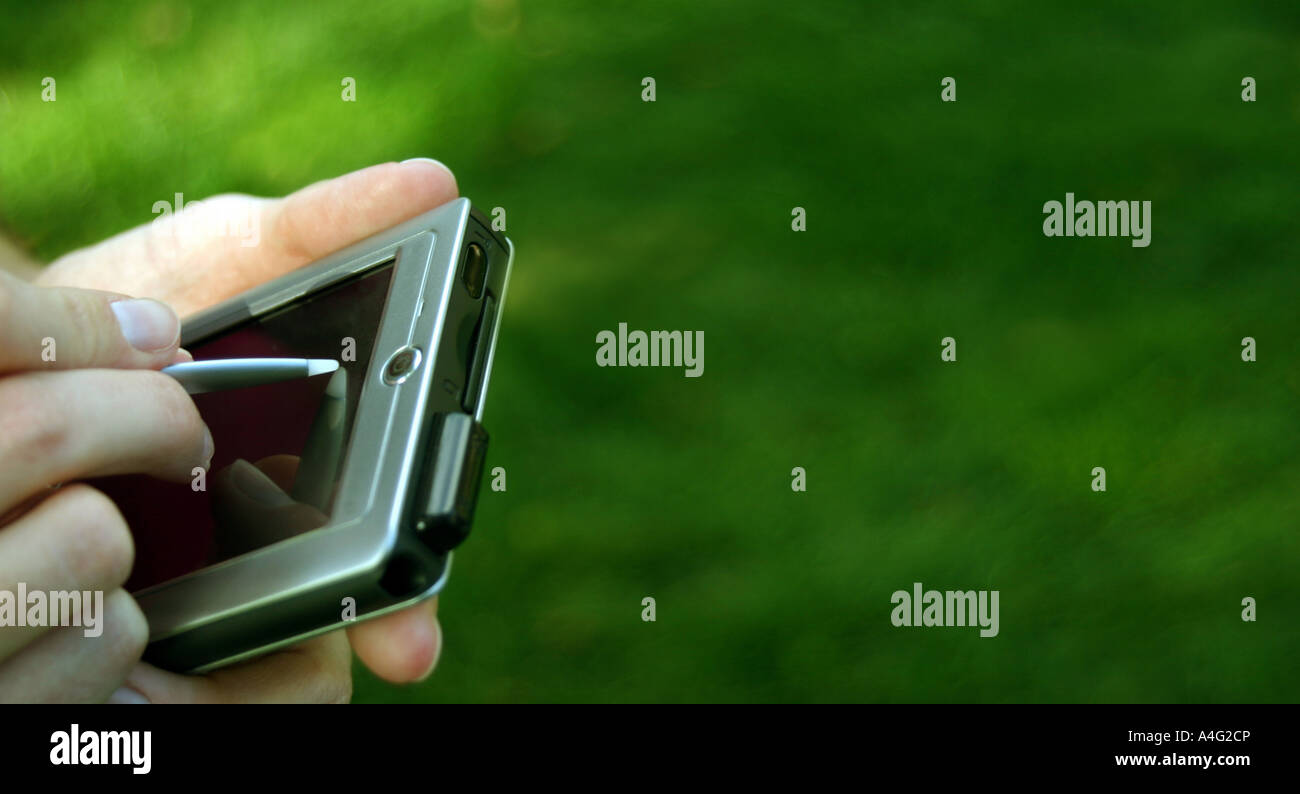 Man using PDA Stock Photo - Alamy