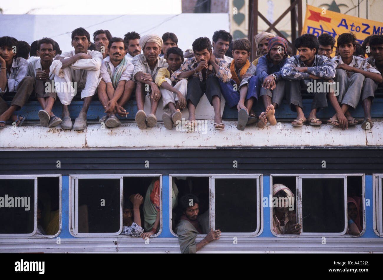 IND India Udaipur Streetscene in the evening Packed bus brings the ...