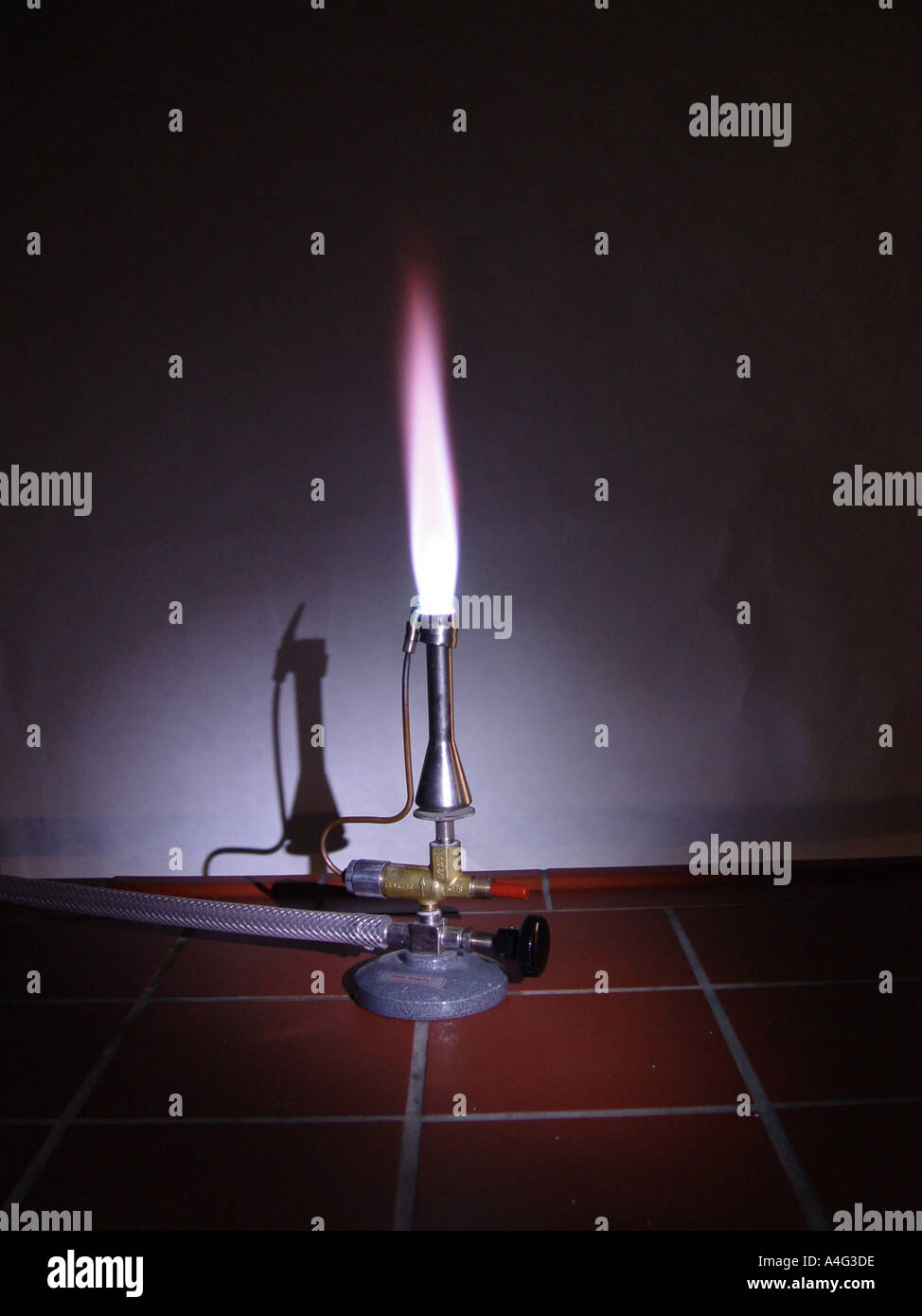 Bunsen burner as symbol for chemistry and or chemical experiments Stock ...