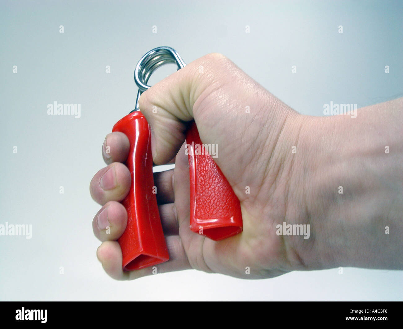 Hand coach for the stabilization of the grasp strength as symbol for ...