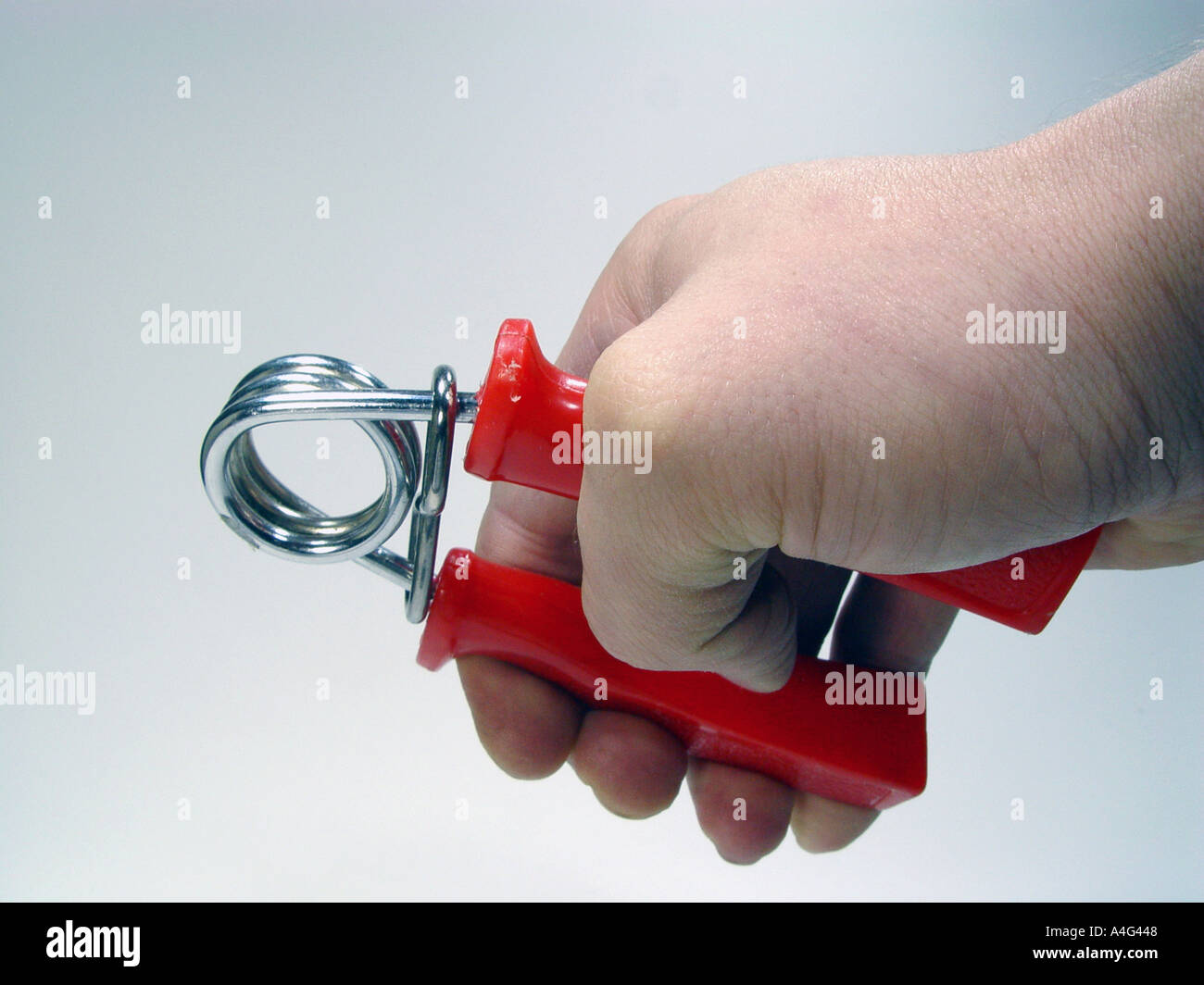 Hand coach for the stabilization of the grasp strength as symbol for ...