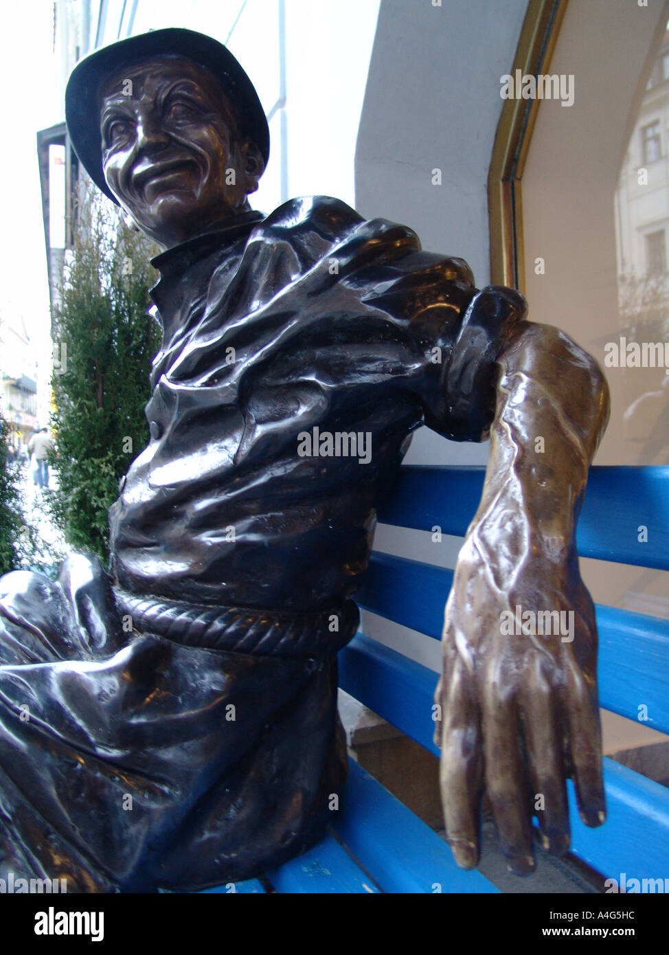 Statue sitting on bench, Starometska, Prague, Czech Replublic, January ...