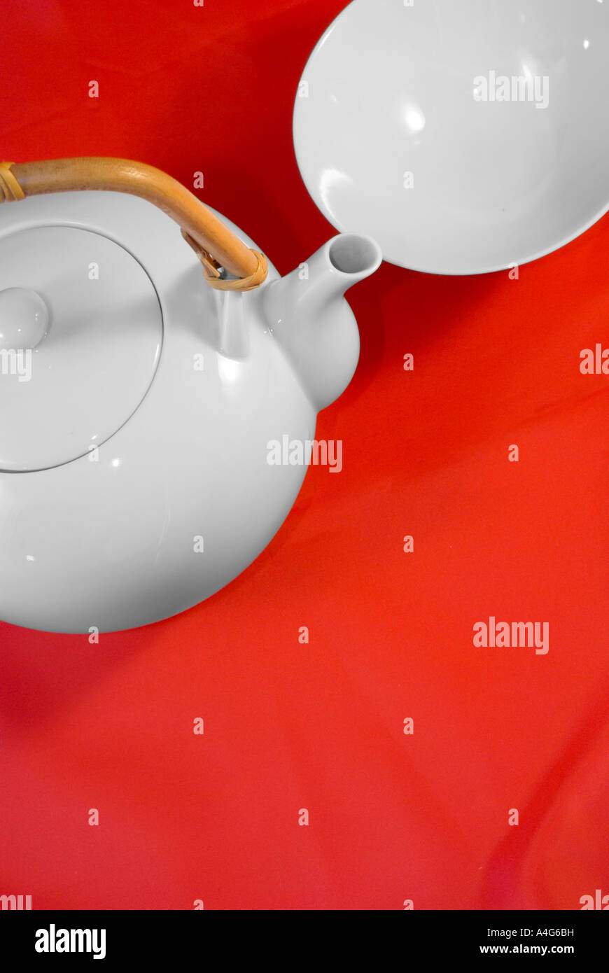 white japanese tea service on red silk background Stock Photo - Alamy
