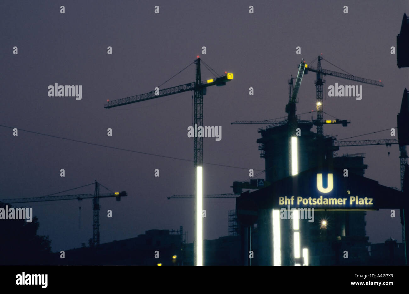 light installation by building cranes at potsdamer platz in berlin ...