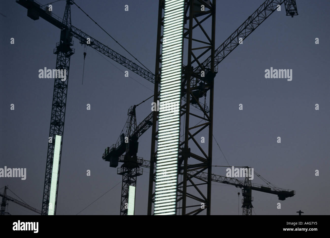 light installation by building cranes at potsdamer platz in berlin ...