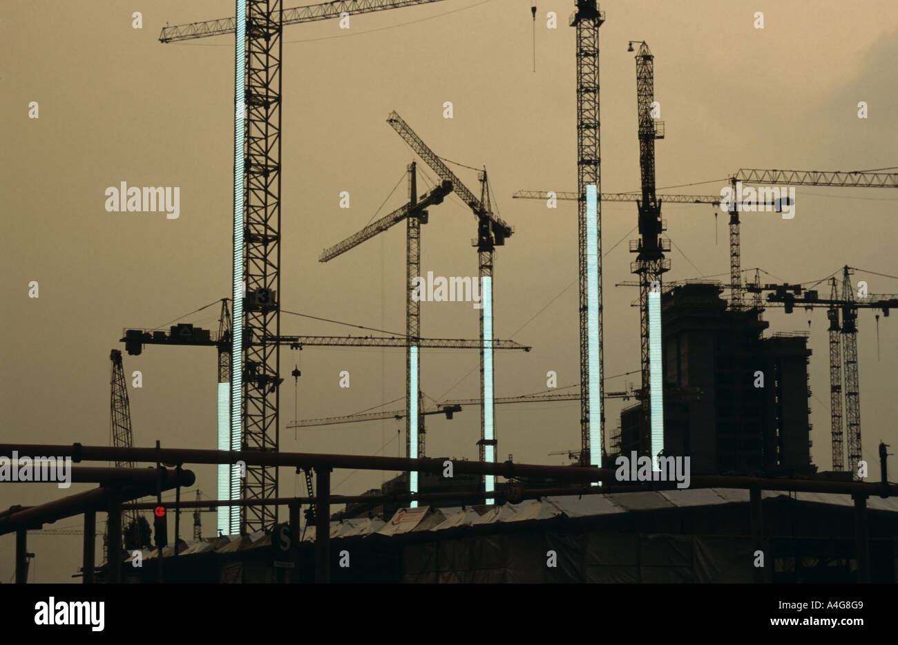 light installation by building cranes at potsdamer platz in berlin ...