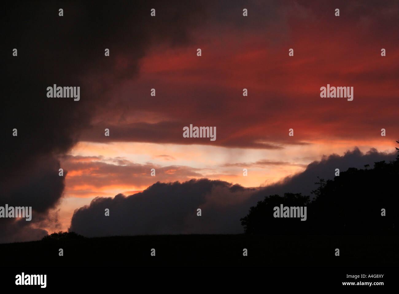 Dramatic opening in evening sky, tornado like dark cloud Stock Photo ...