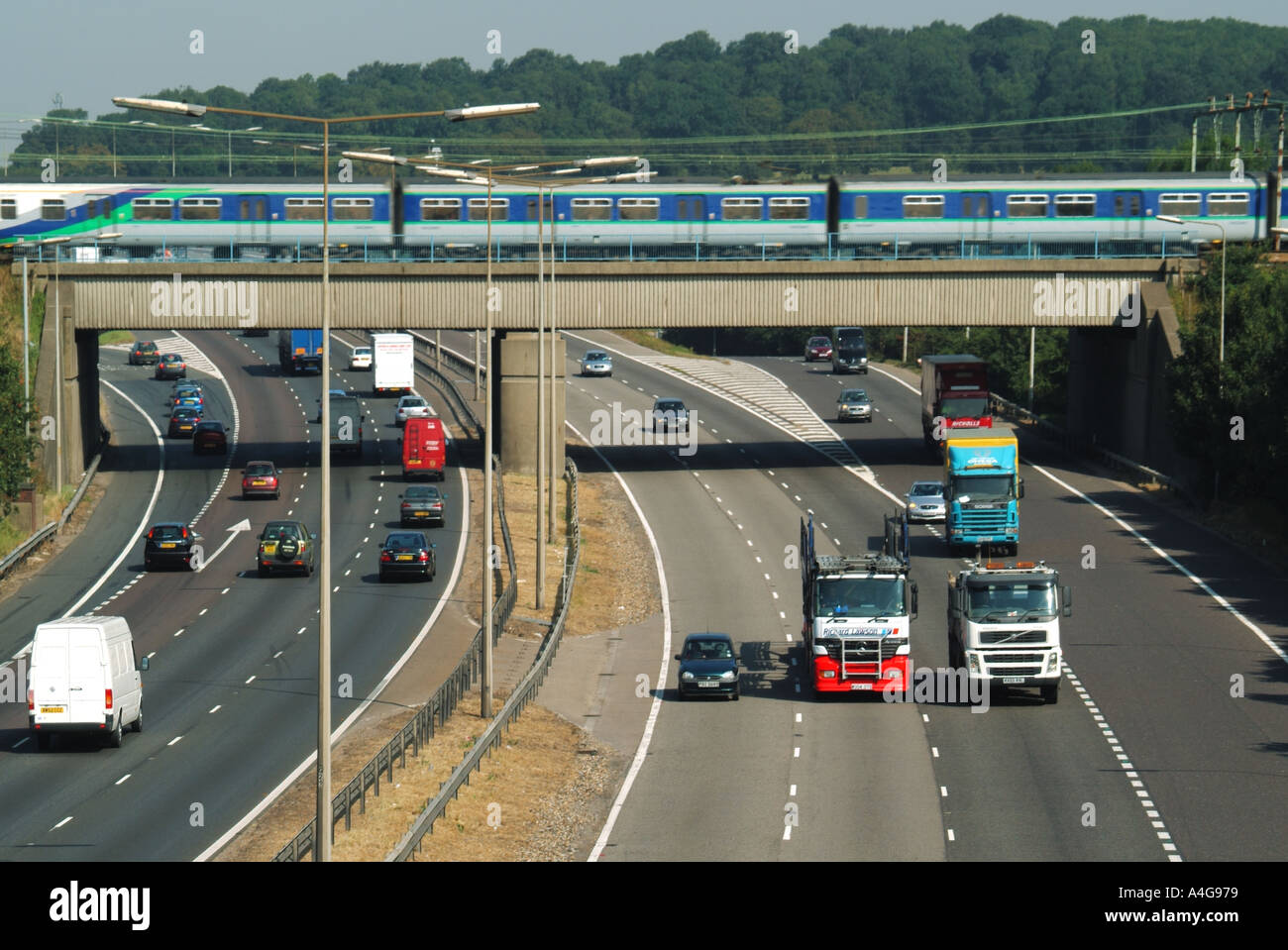Transport infrastructure railway bridge & fast passenger train crossing ...