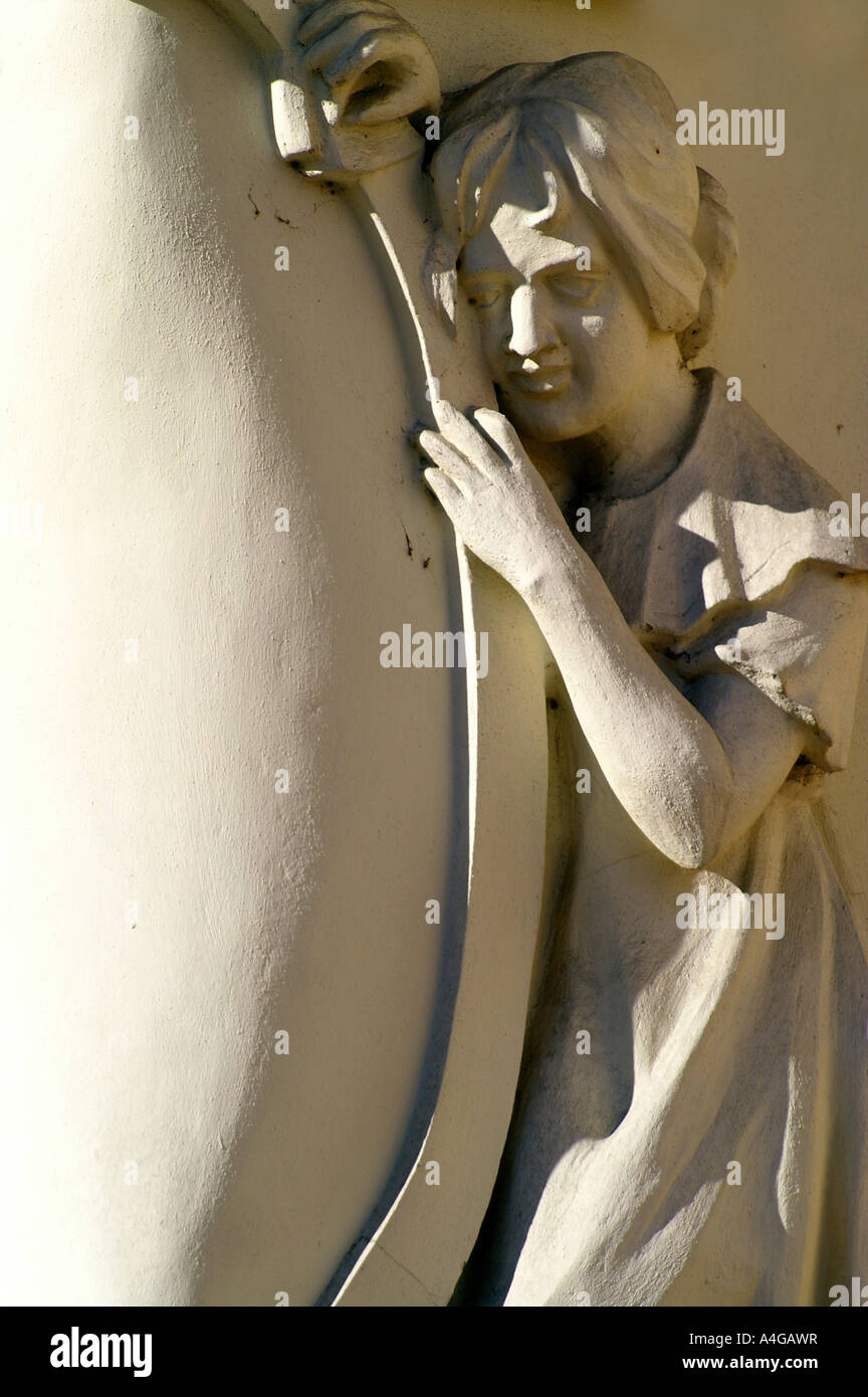 Statue relievo baroque girl holding oval edge, Banska Bystrica ...