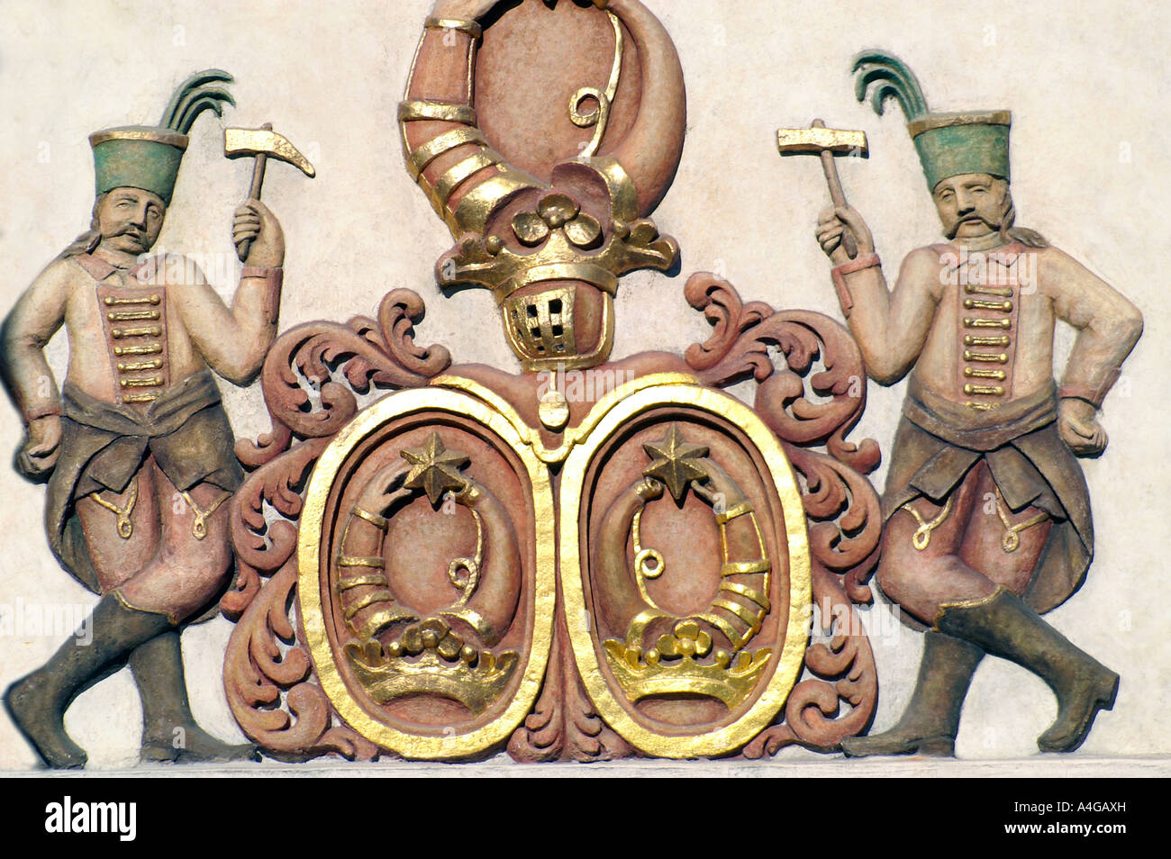 Medieval mining heraldry at Benicky House facade in Banska Bystrica ...