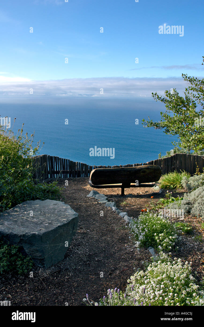 Bench with view on the ocean Stock Photo - Alamy