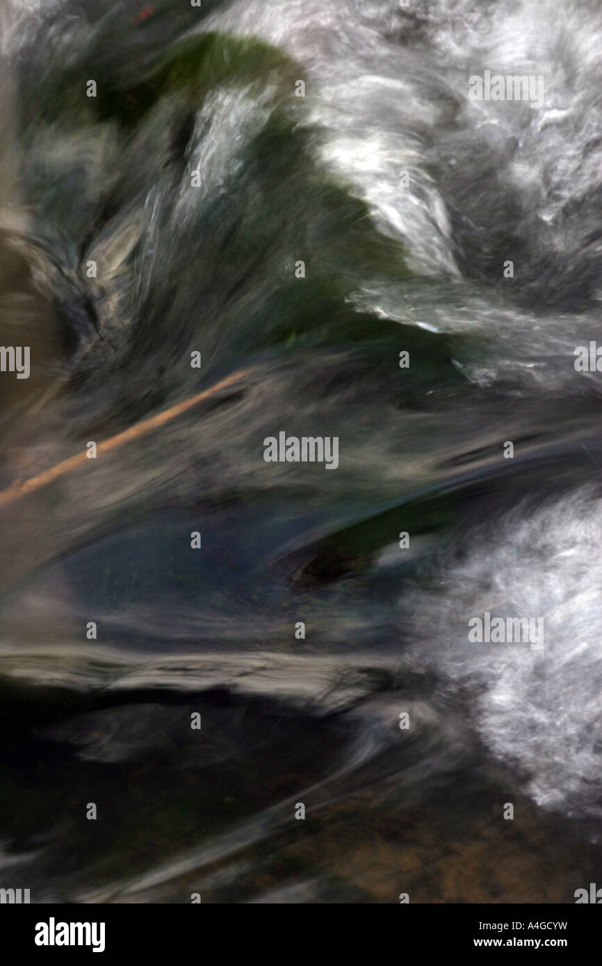 creek flowing with whitewater Stock Photo - Alamy