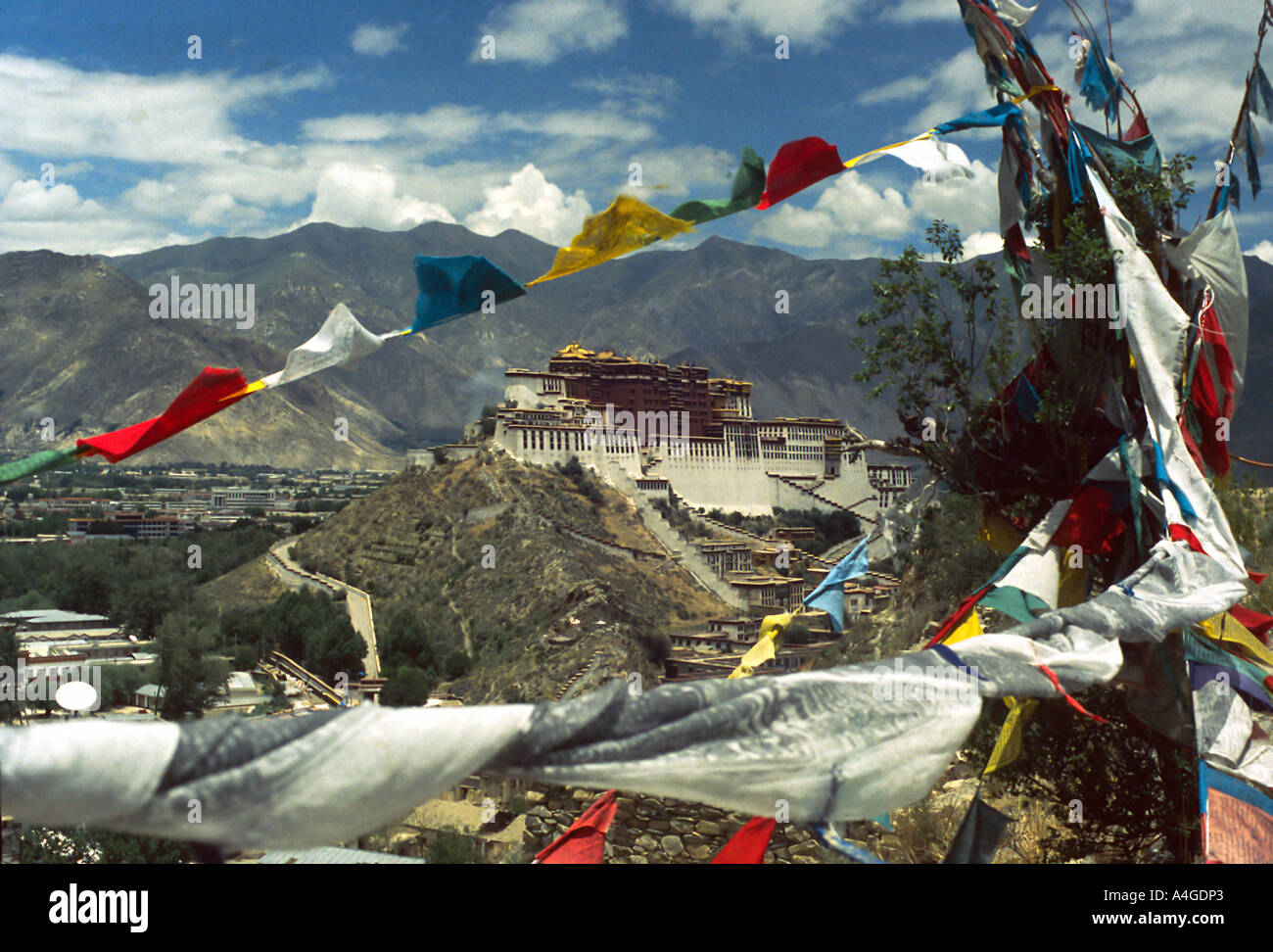 Prayer flags framing the Potala Palace former residence of the Dali ...