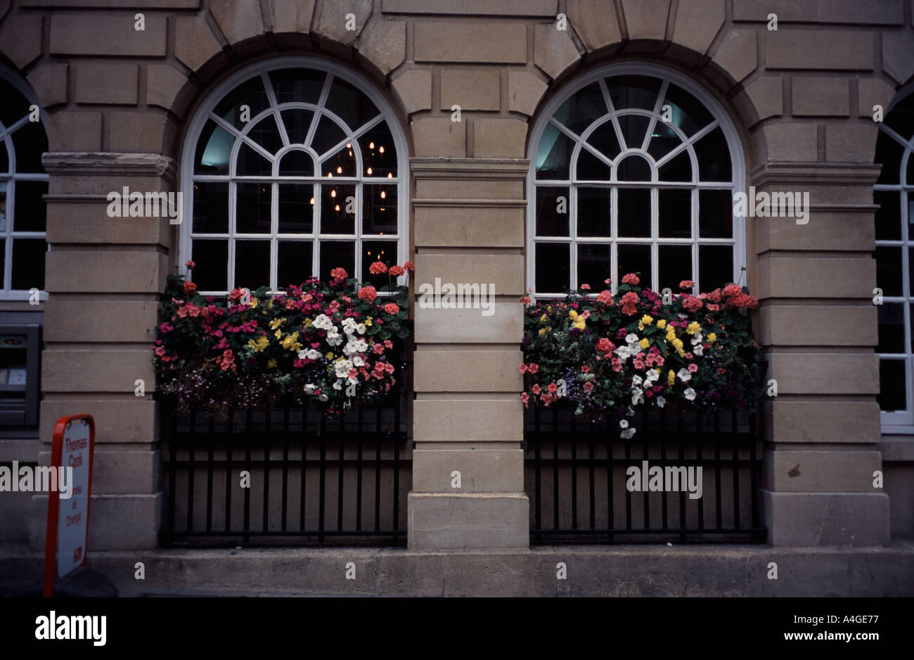 Window boxes, floral display outside the HSBC bank Bath Spa, Somerset ...
