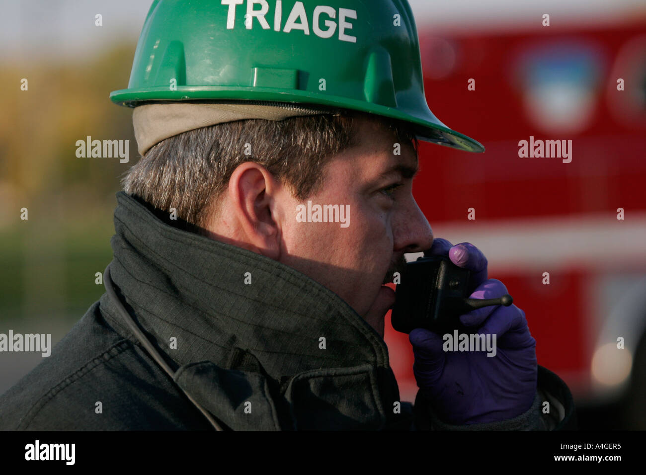 Firefighter talking to victim hi-res stock photography and images - Alamy
