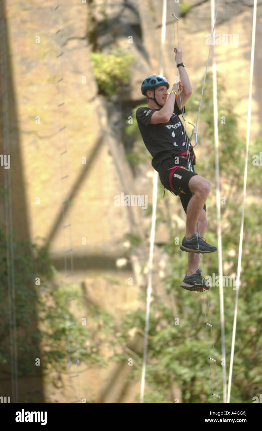 Competitors climbing in the Rat Race Urban Adventure Race Ratho ...