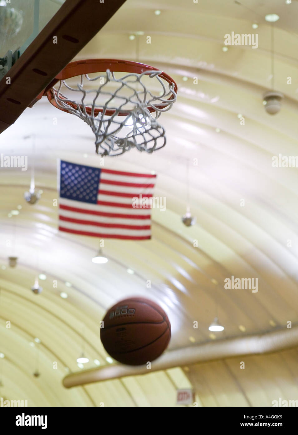 The basketball falls through the basket hi-res stock photography and ...