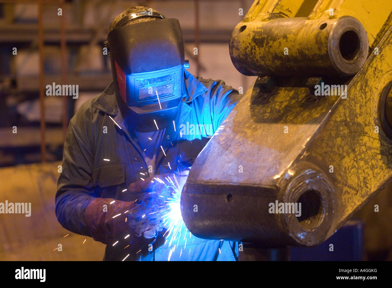 A welder repairs plant in his workshop Stock Photo - Alamy