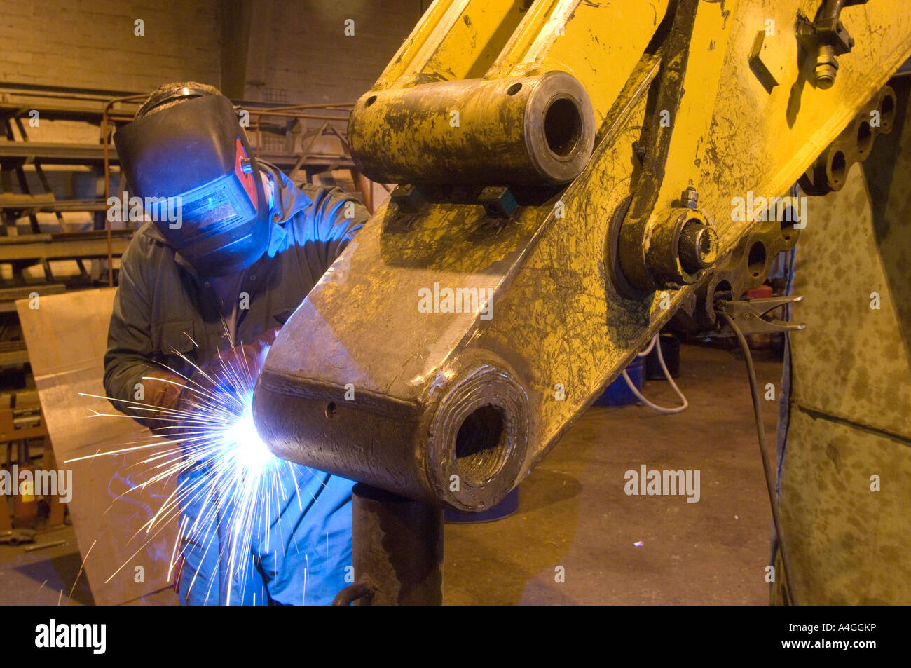 A welder repairs plant in his workshop Stock Photo - Alamy