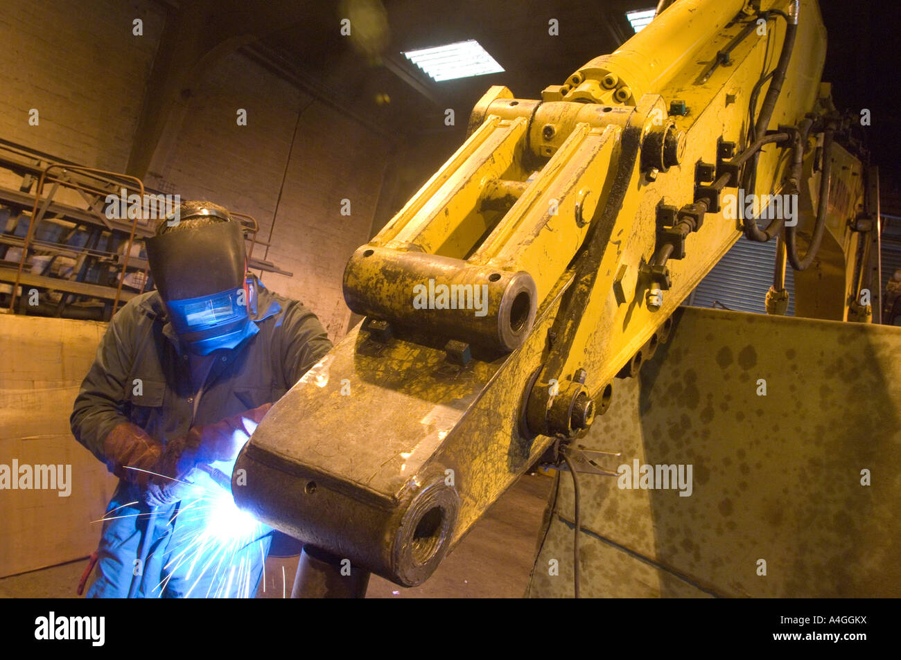 A welder repairs plant in his workshop Stock Photo - Alamy
