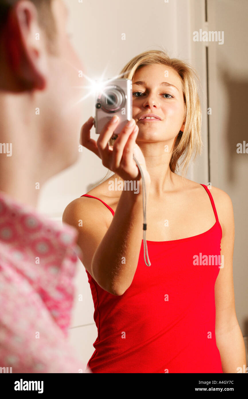 Female taking picture of male Stock Photo - Alamy