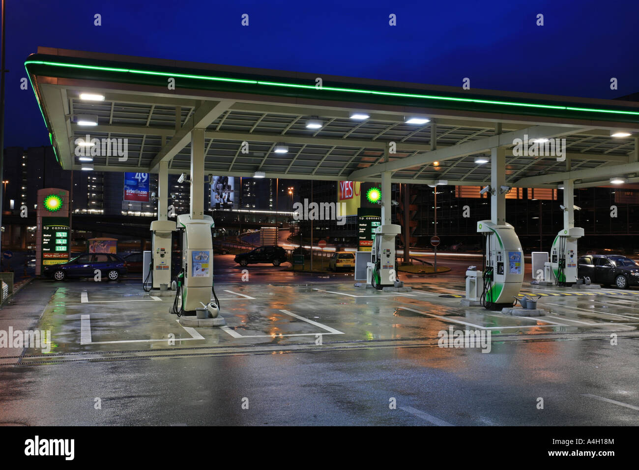 Expensive fuel - DRI of a gas station with Wild Bean Café and other ...