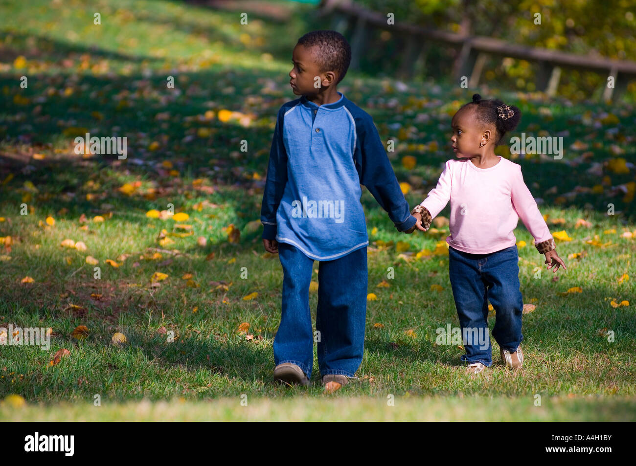 Children walking together Stock Photo - Alamy