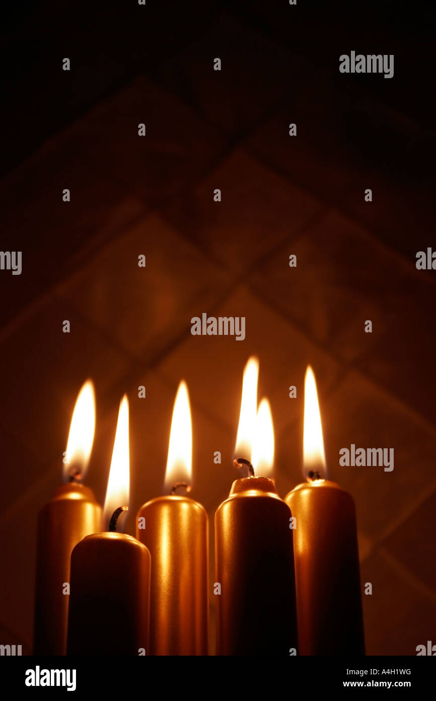 Group of lit candles Stock Photo - Alamy