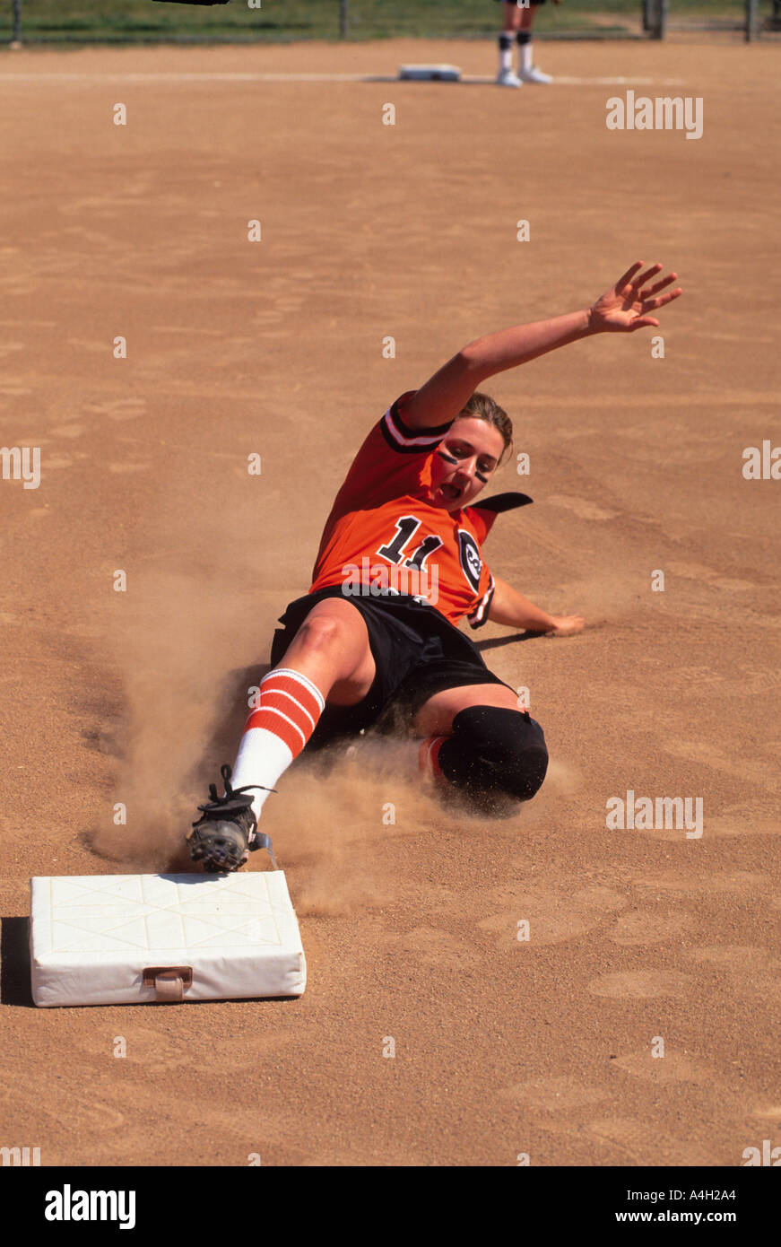 Girl softball slide hi-res stock photography and images - Alamy