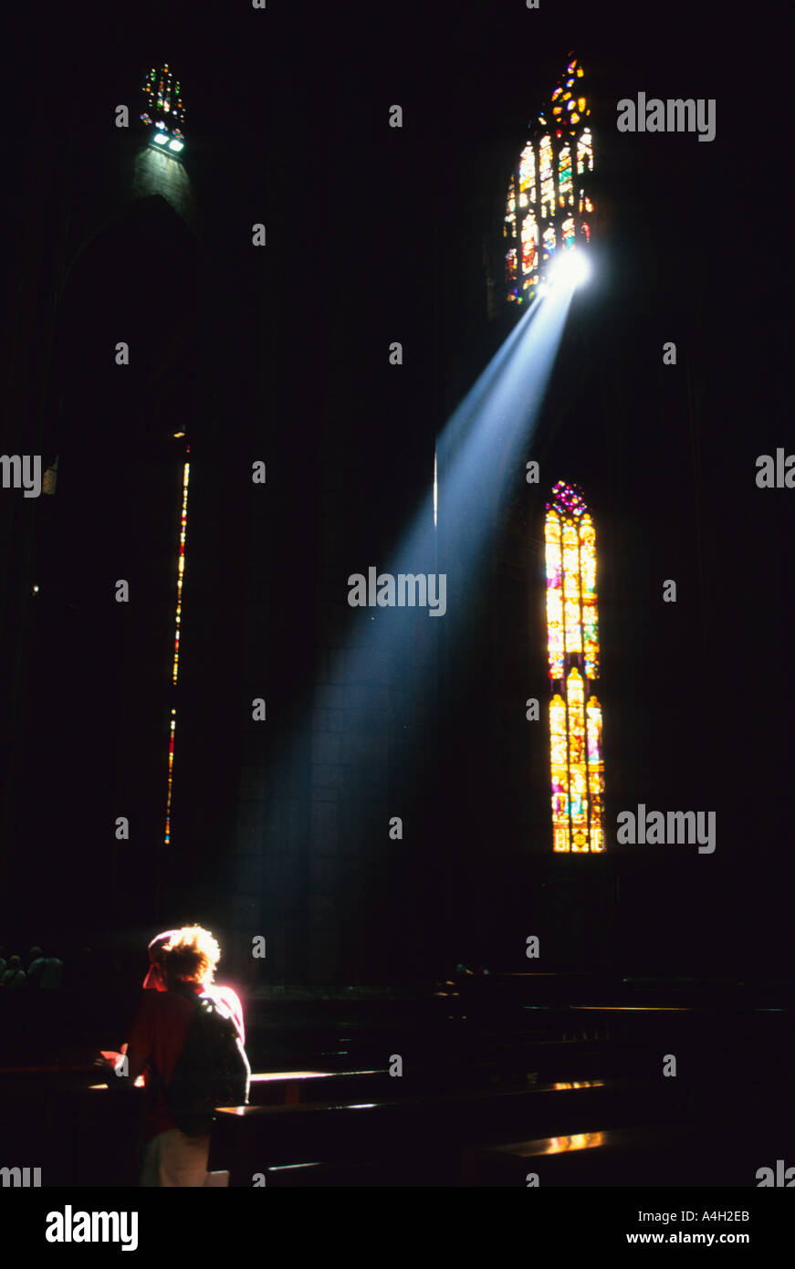 Ray of light from a stained glass window in a CHURCH EUROPE Stock Photo ...
