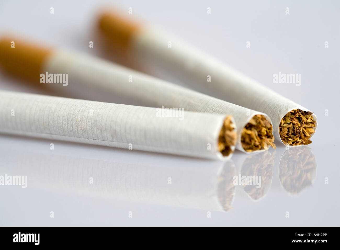 Detail of three cigarettes Stock Photo - Alamy