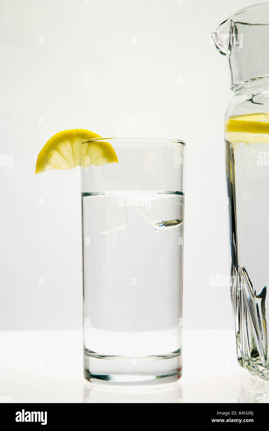 Glass and pitcher of water Stock Photo - Alamy