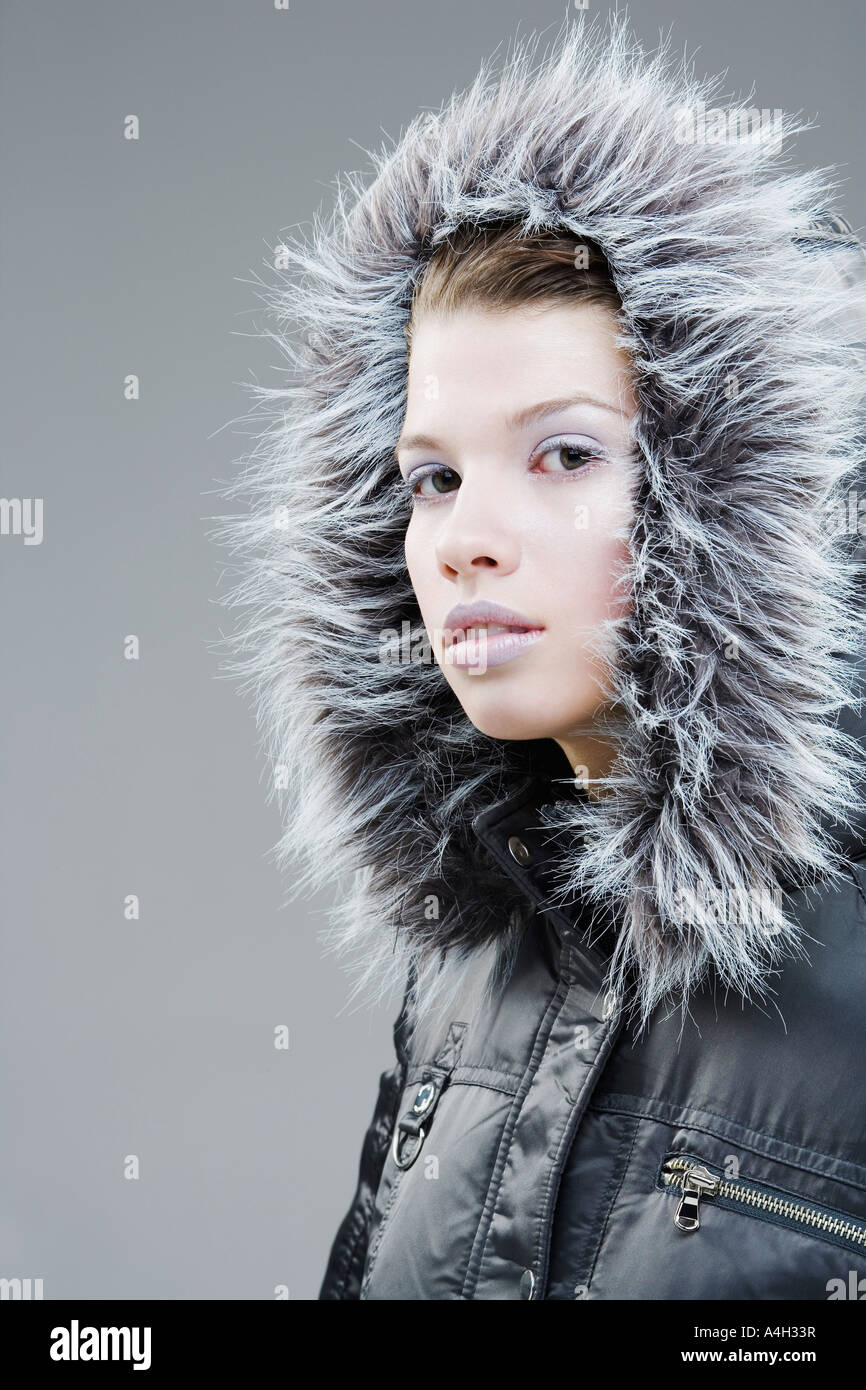 Woman wearing a winter jacket Stock Photo - Alamy