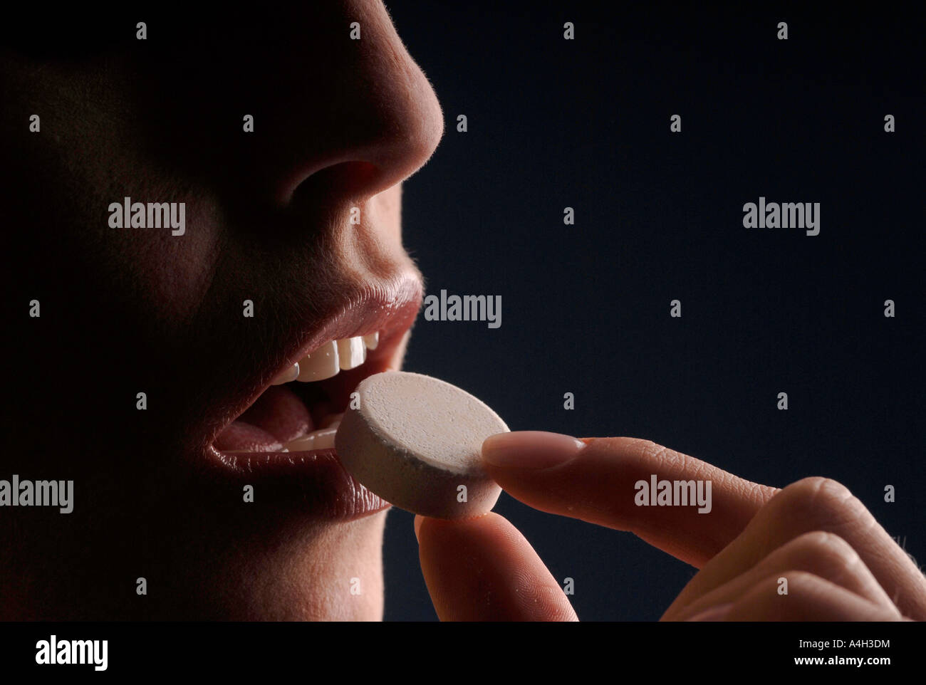 Young woman takes a tablet Stock Photo - Alamy