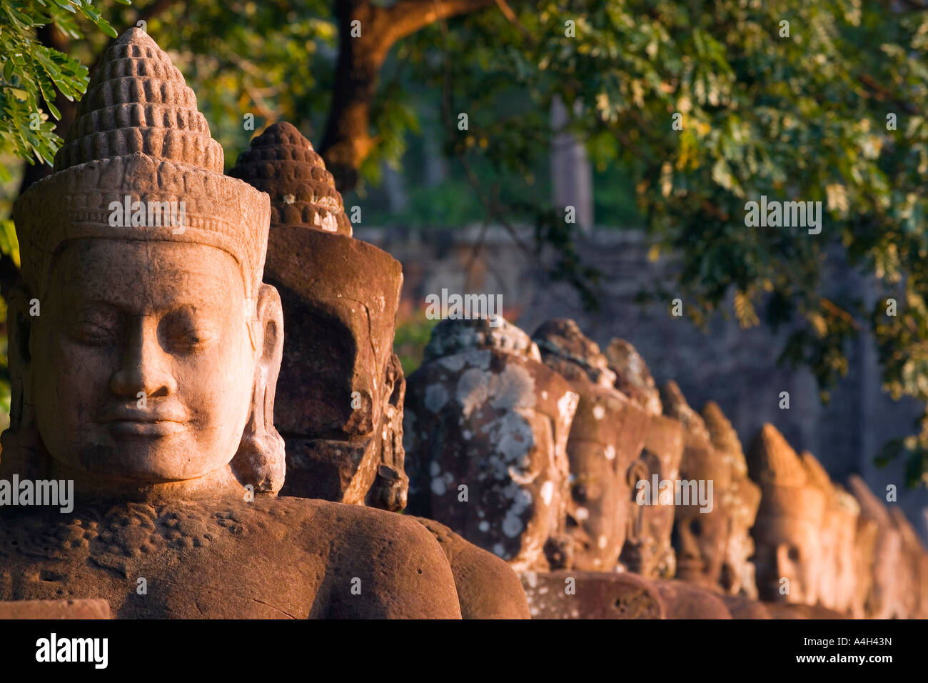 Head statues Angkor Wat Temple Complex Angkor Thom Cambodia Stock Photo ...