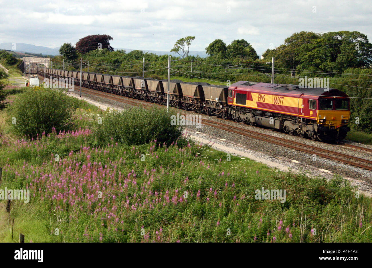 EWS coal train on West Coast mainline Stock Photo - Alamy