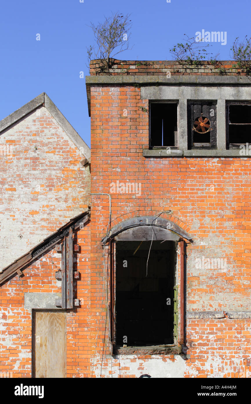 Derelict former industrial factory building showing decay Stock Photo ...