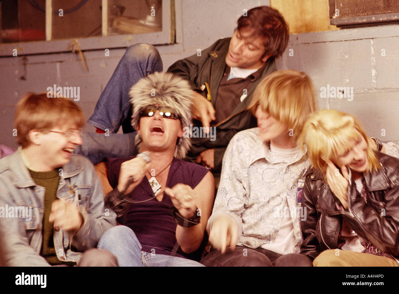 Rock band Sonic Youth being interviewed for local television at an ...