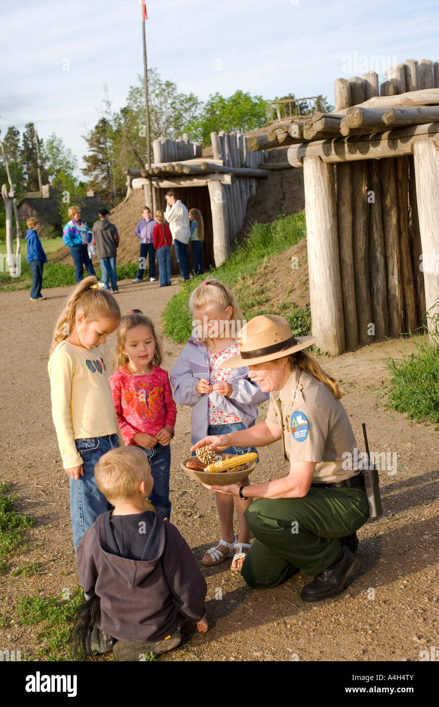 Park Ranger showing kids artifacts at On A Slant Mandan Village in Fort ...