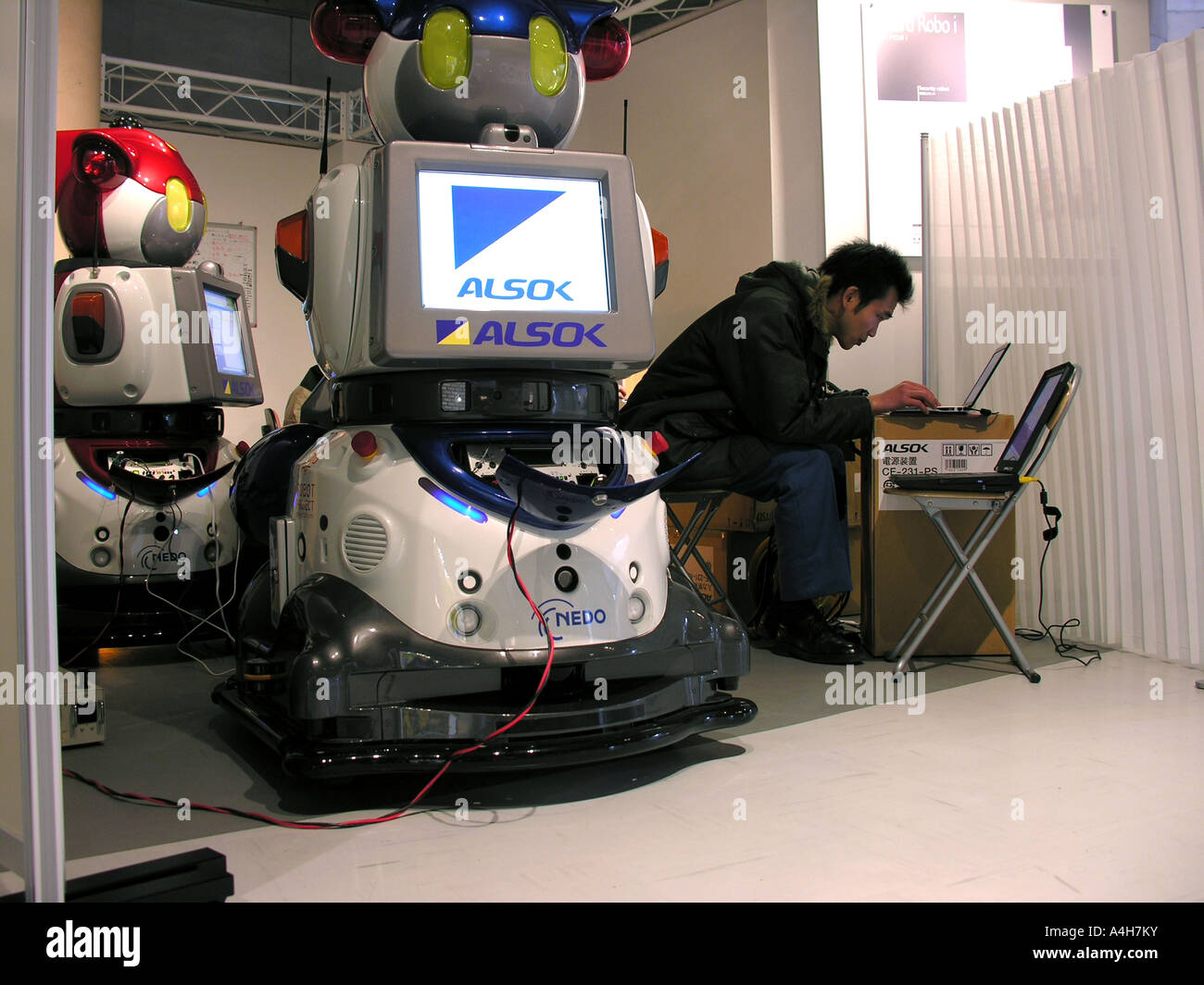 Tinkering with the robots Aichi Expo 2005 Japan Stock Photo - Alamy