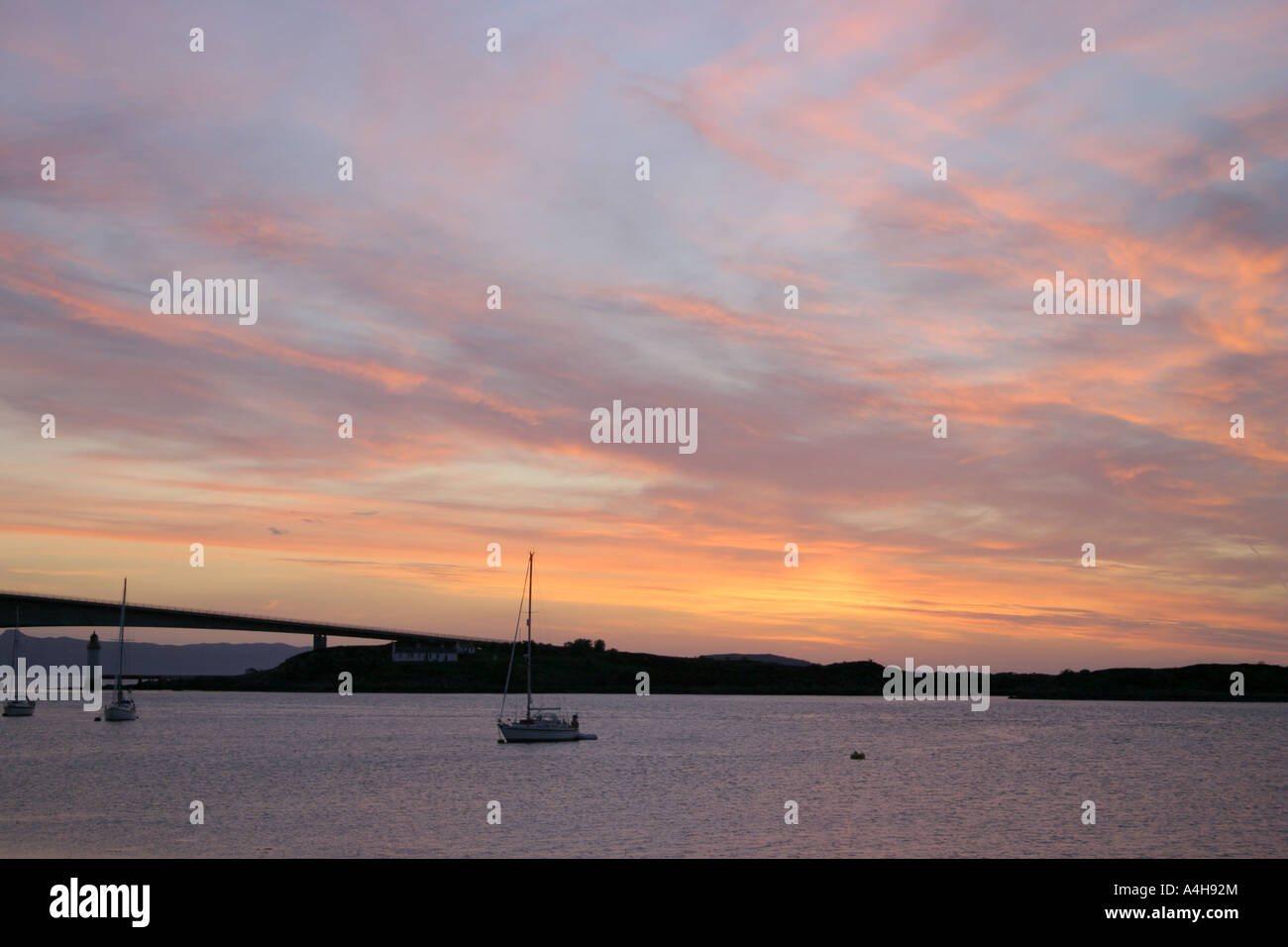 June sunset over the Skye Bridge, from Kyleakin, Isle of Skye, Inner ...