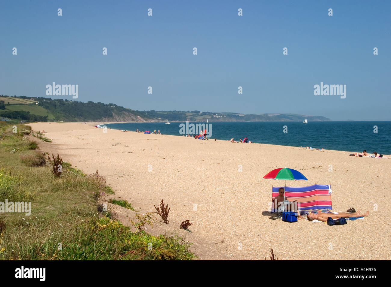 Sunbathers on the historic Slapton Sands beach Devon England Stock ...