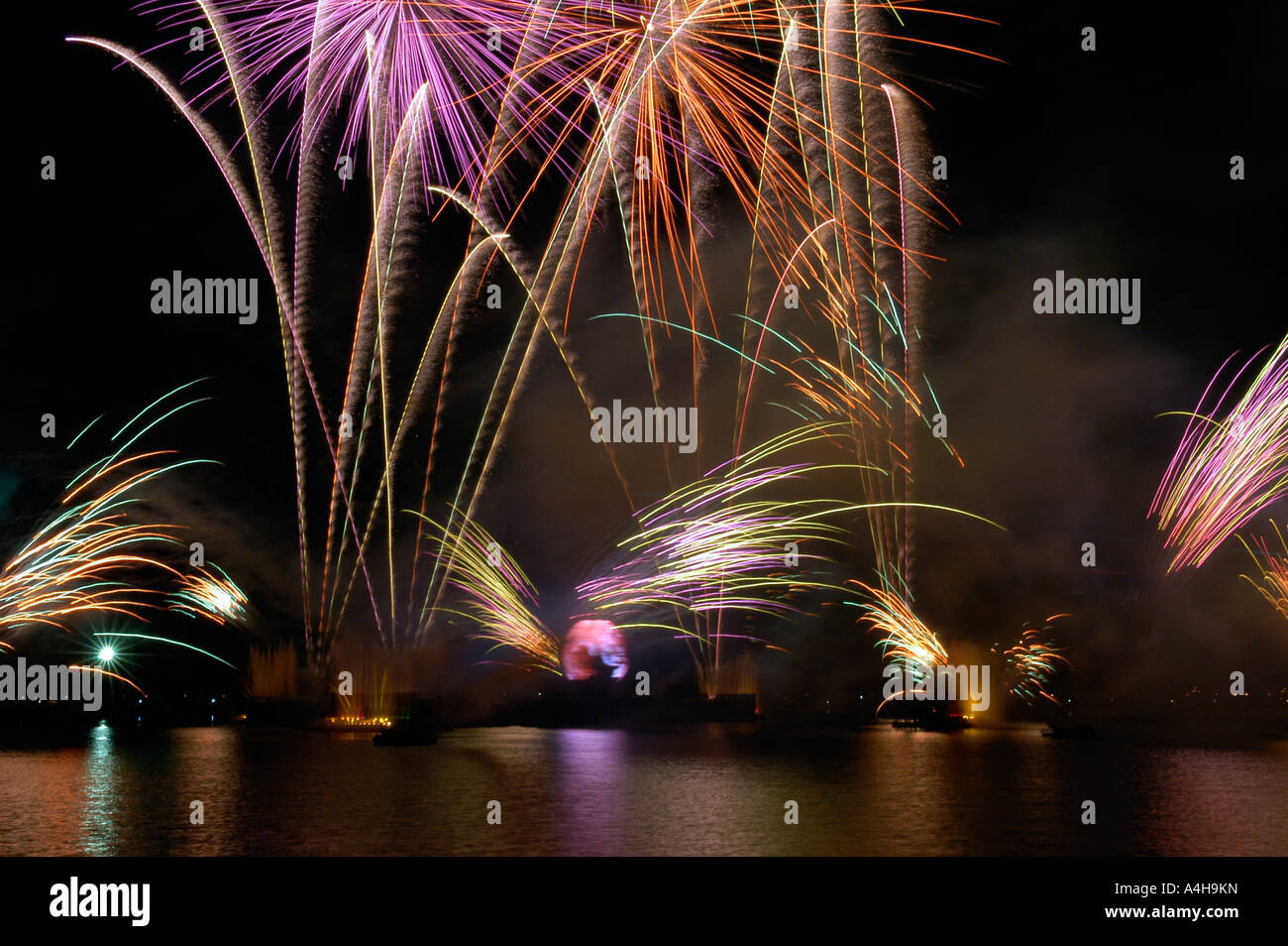 Lavender, yellow, and orange fireworks Stock Photo - Alamy