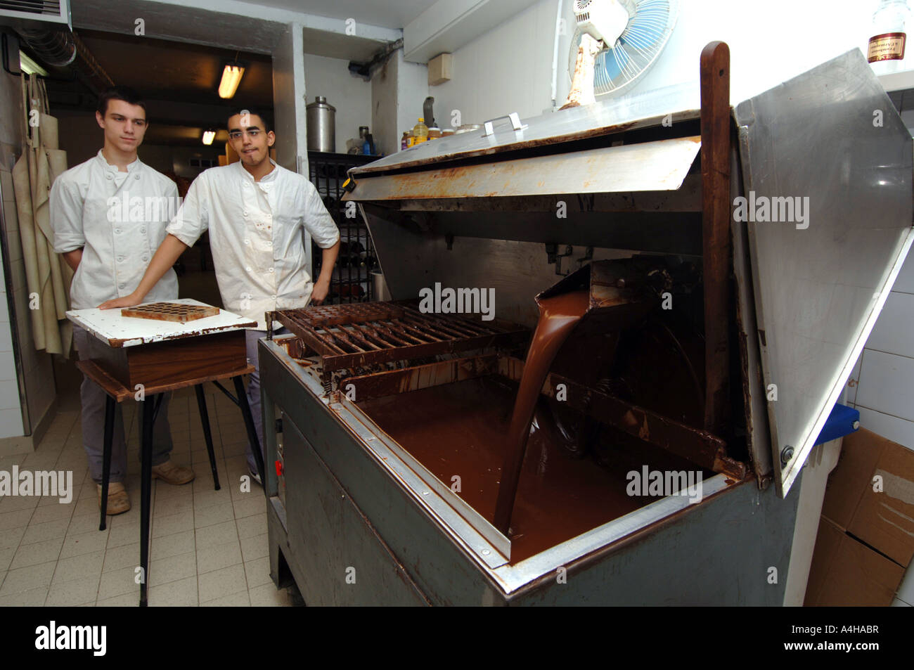 Chocolatiers making chocolate in Paris France Stock Photo - Alamy