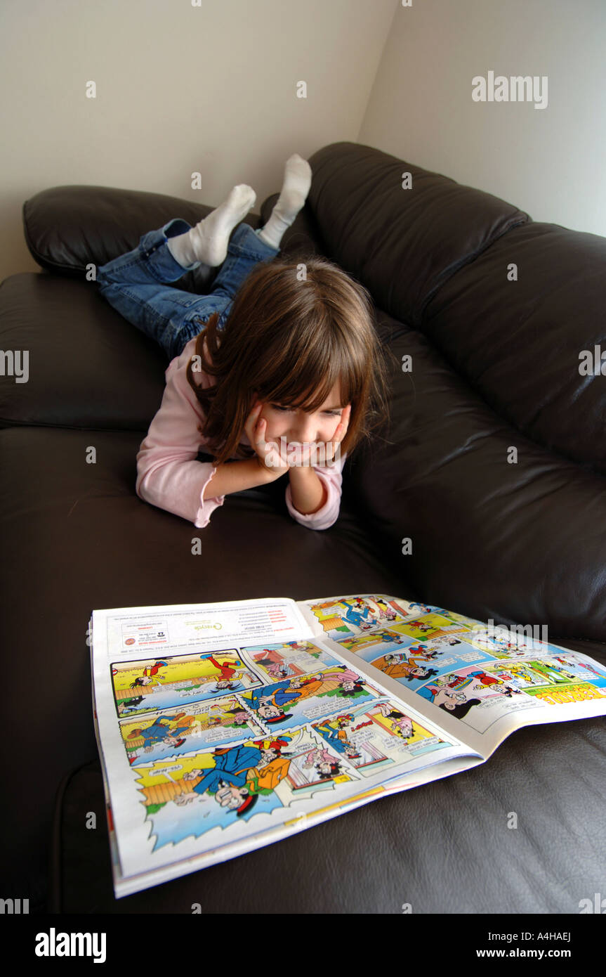 Comic, girl reading comic, comics Stock Photo - Alamy