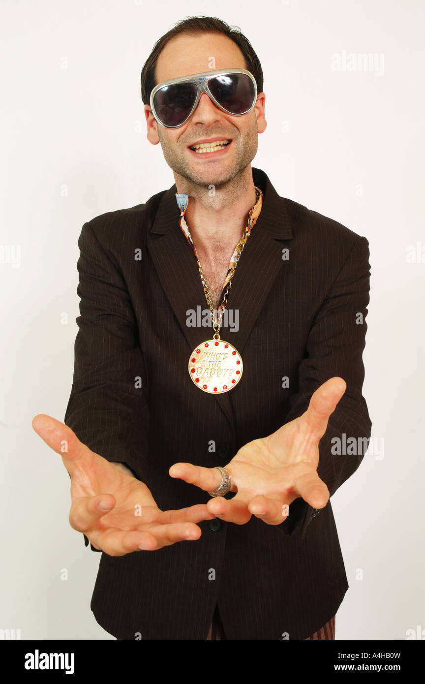 Cheeky smiling man suit hi-res stock photography and images - Alamy