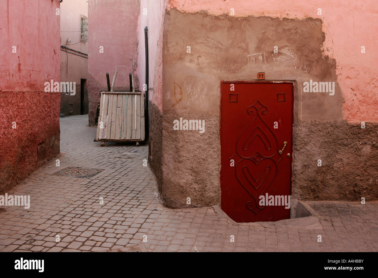 Marrakech Morocco doorway & cart Stock Photo - Alamy