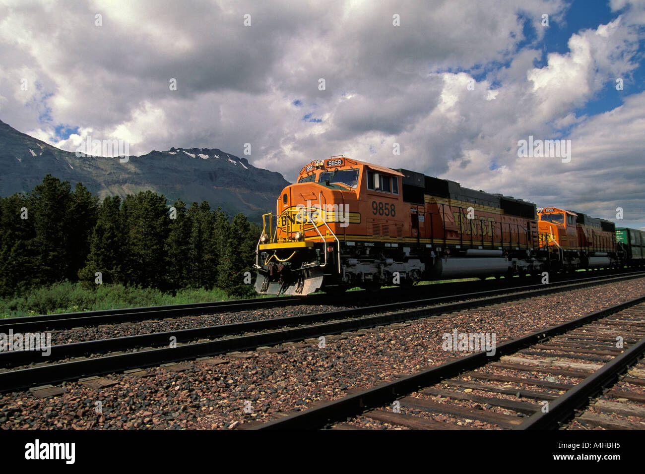 Freight train in Rocky Mountains at the Continental Divide, Montana ...