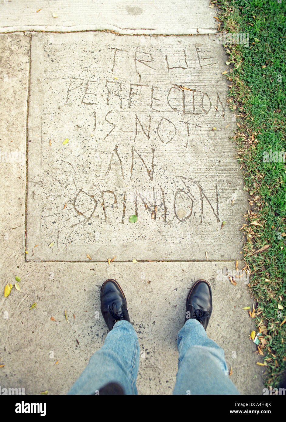 True Perfection is not an Opinion, written on a pavement Stock Photo ...