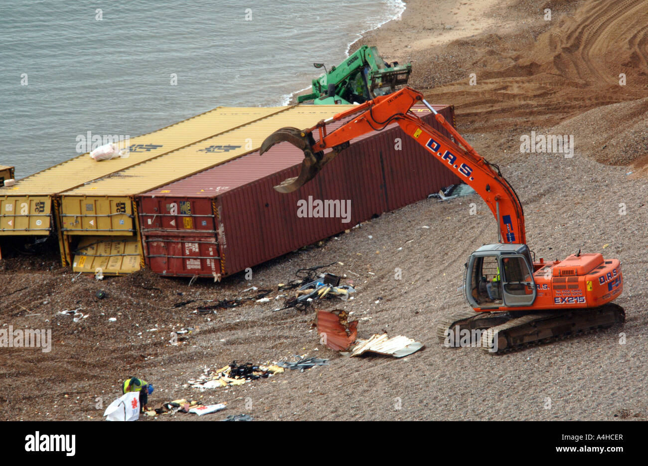 Clearing of containers washed up on the beach after MSC Napoli cargo ...